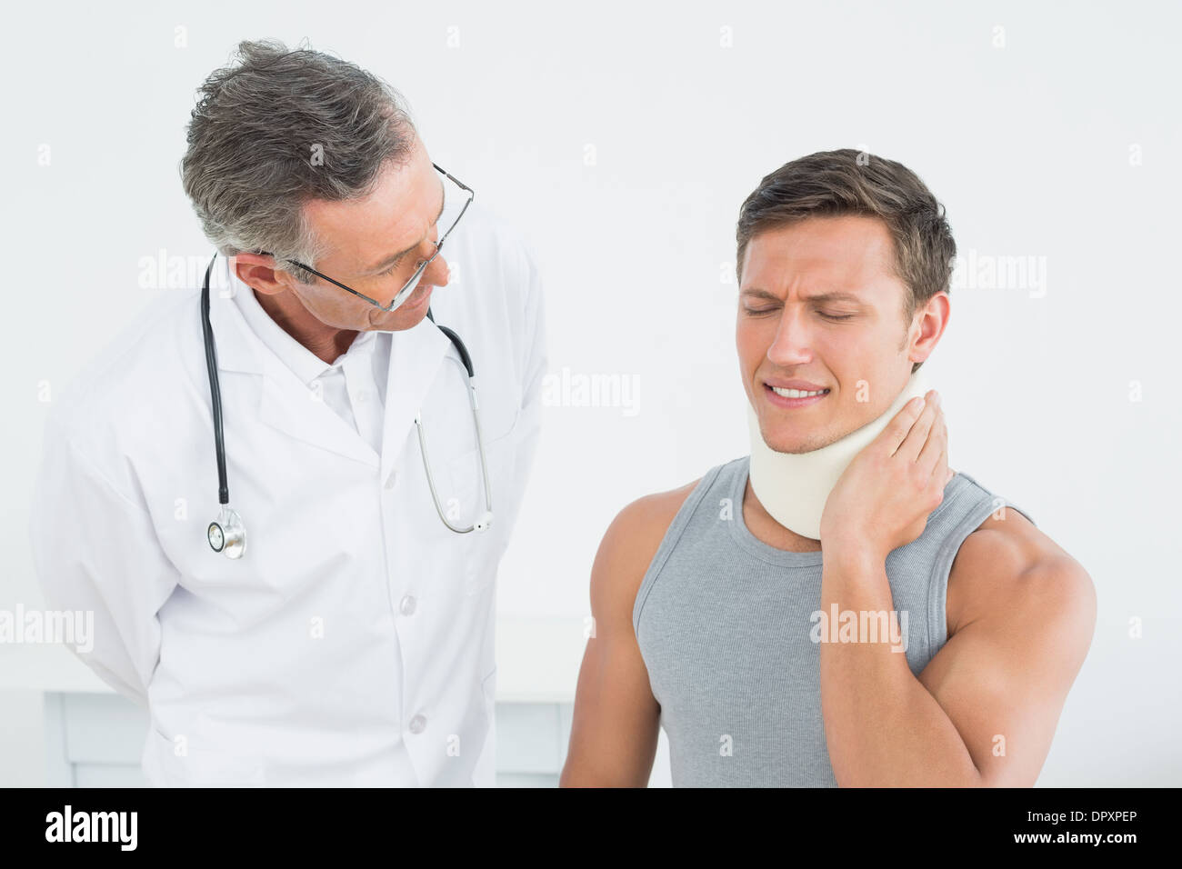Doctor listening to patient with concentration Stock Photo - Alamy