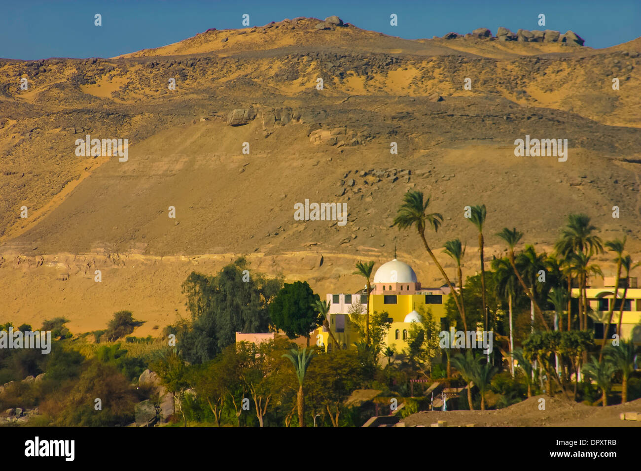 Desert hills above mosque on outskirts of Aswan, Egypt Stock Photo - Alamy