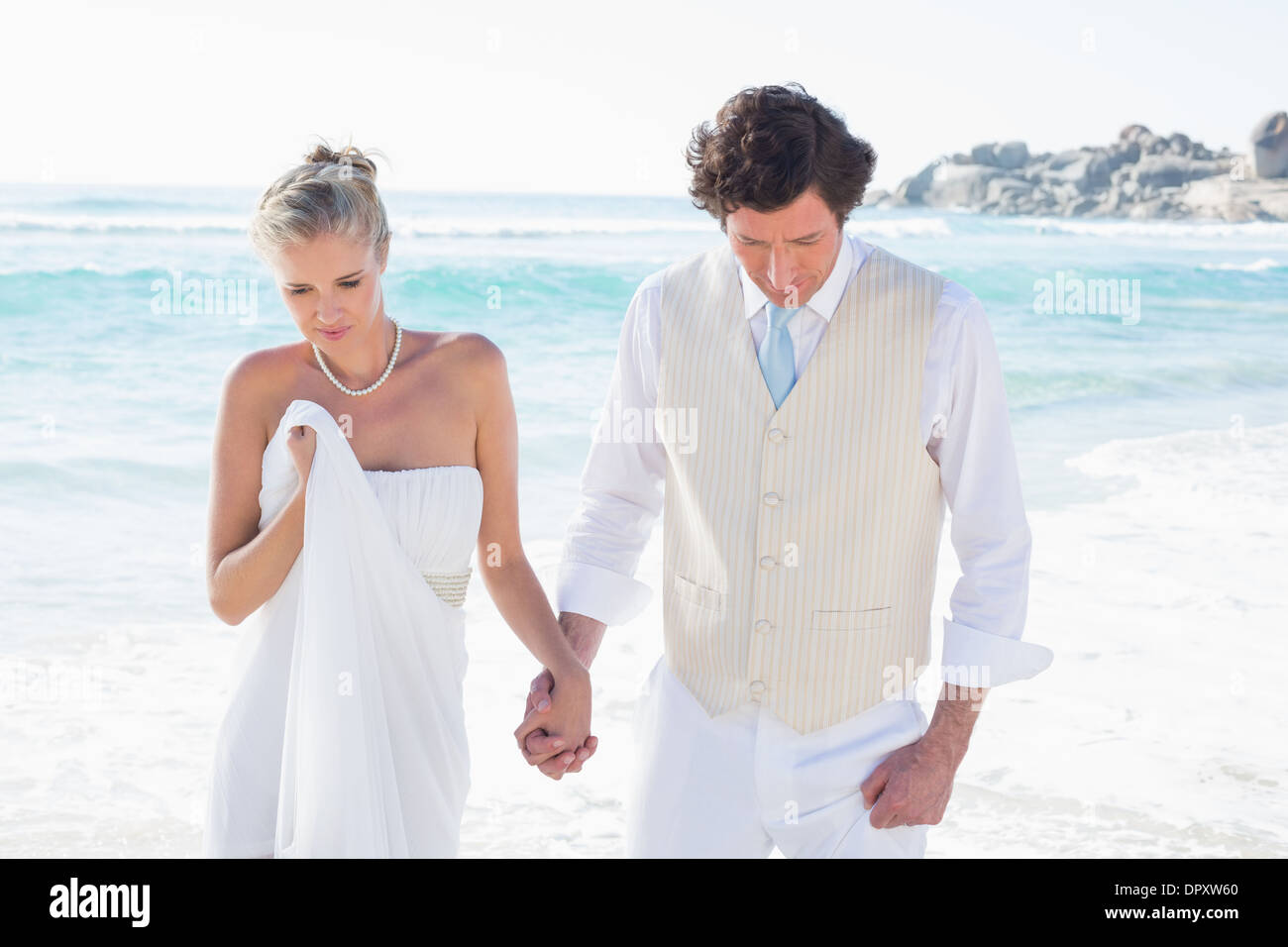 Woman bright dress man hands sea hi-res stock photography and images ... Woman bright dress man hands sea hi-res stock photography and images ...