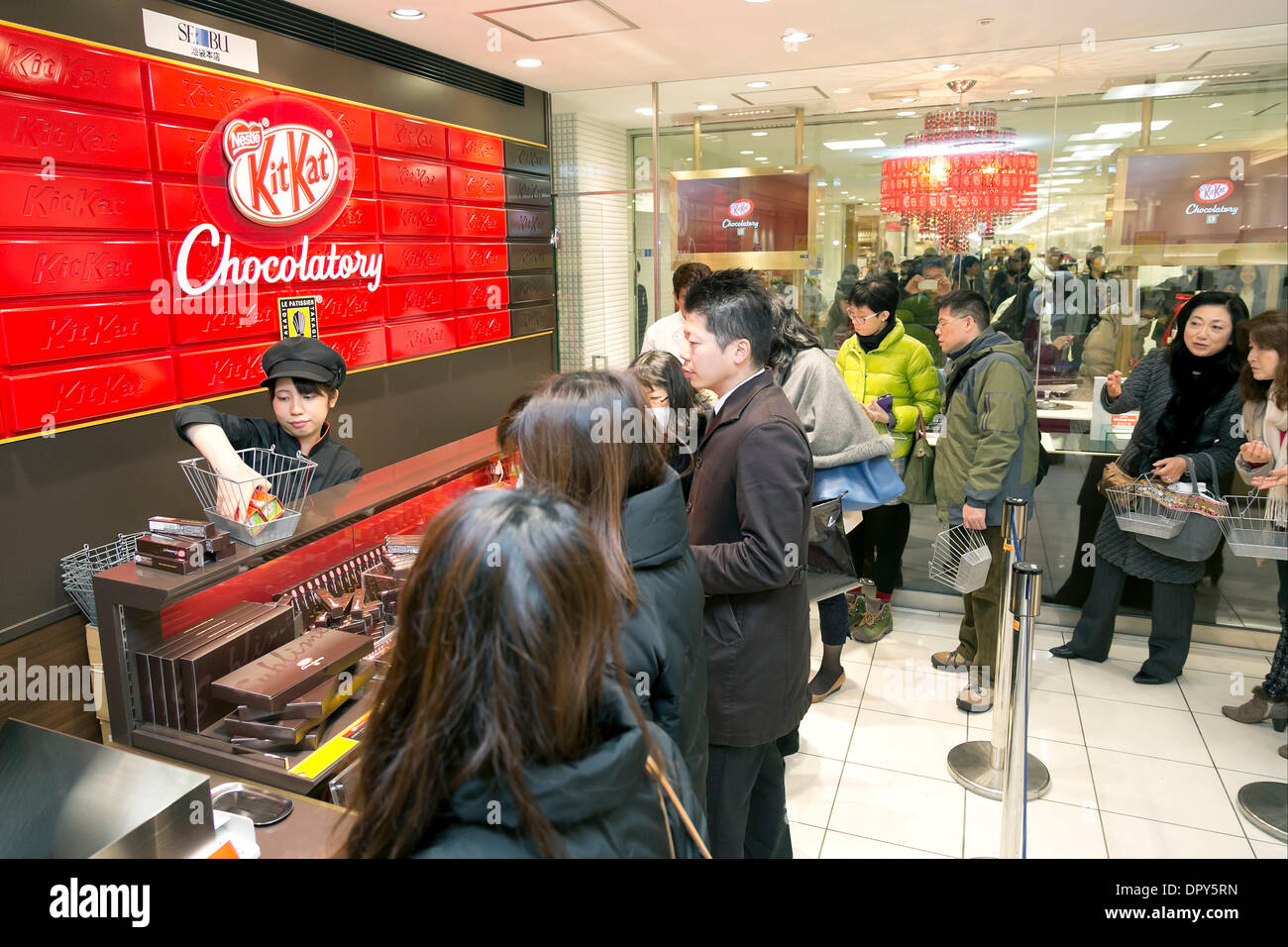 Tokyo, Japan. 17th January 2014. Customers buy the first limited ...