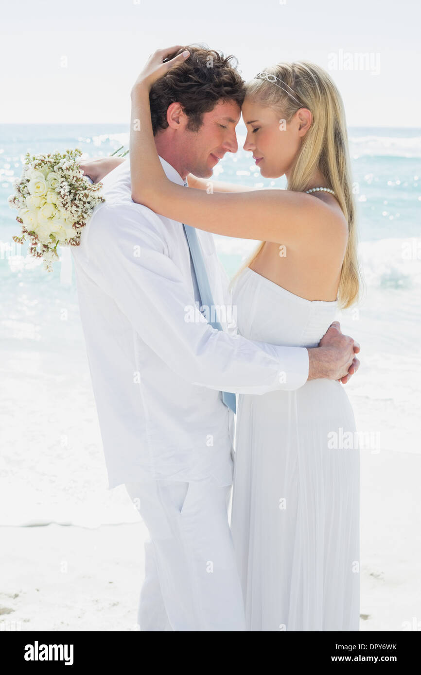 Wedding couple hugging bride hi-res stock photography and images - Alamy