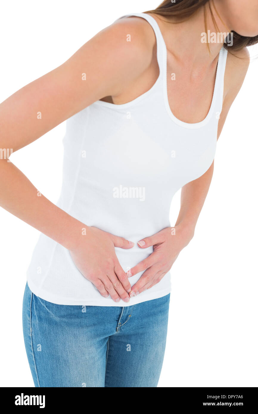Close-up mid section of a casual woman with stomach pain Stock Photo ...