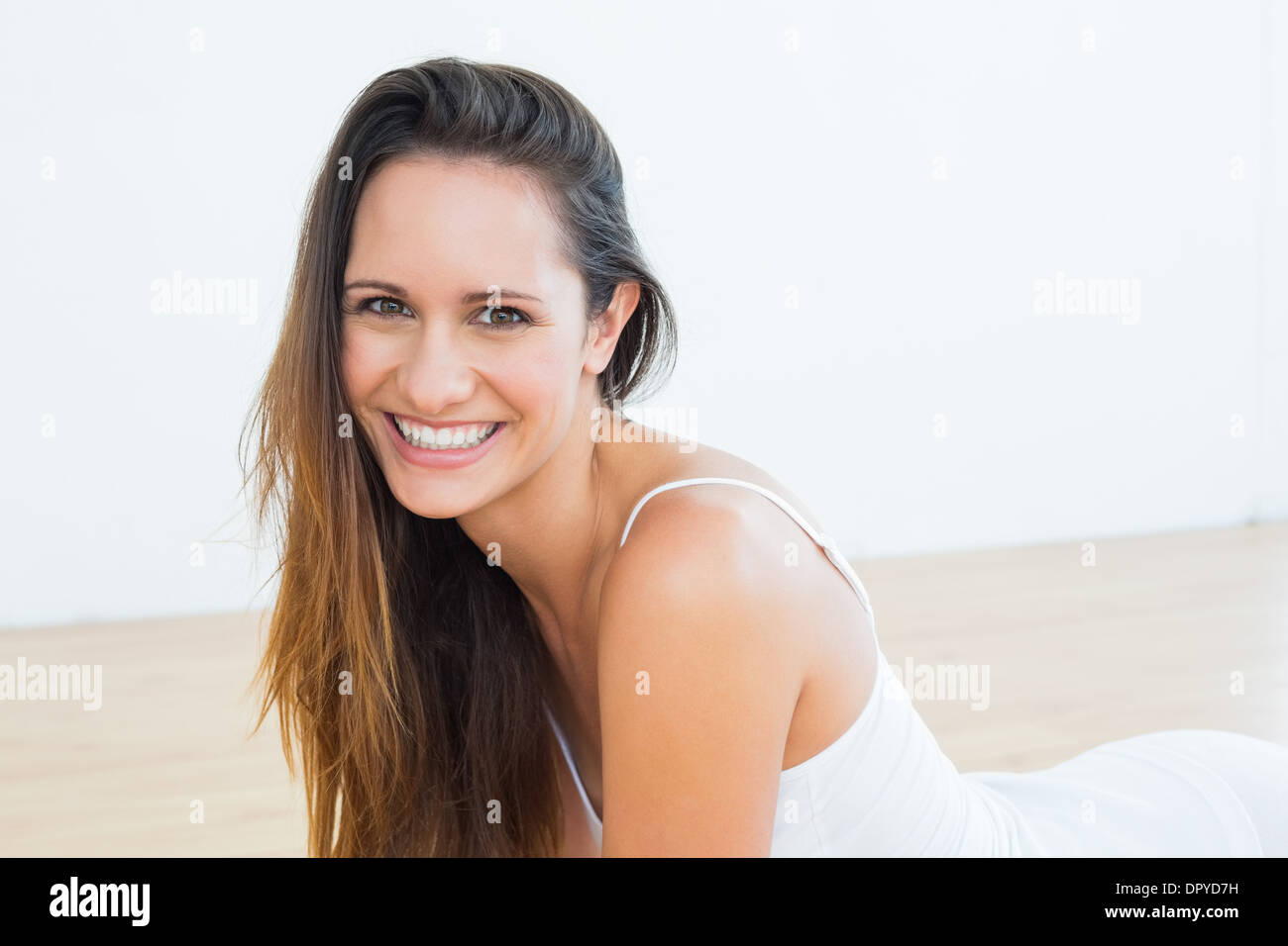 Portrait of a fit cheerful woman in fitness studio Stock Photo - Alamy