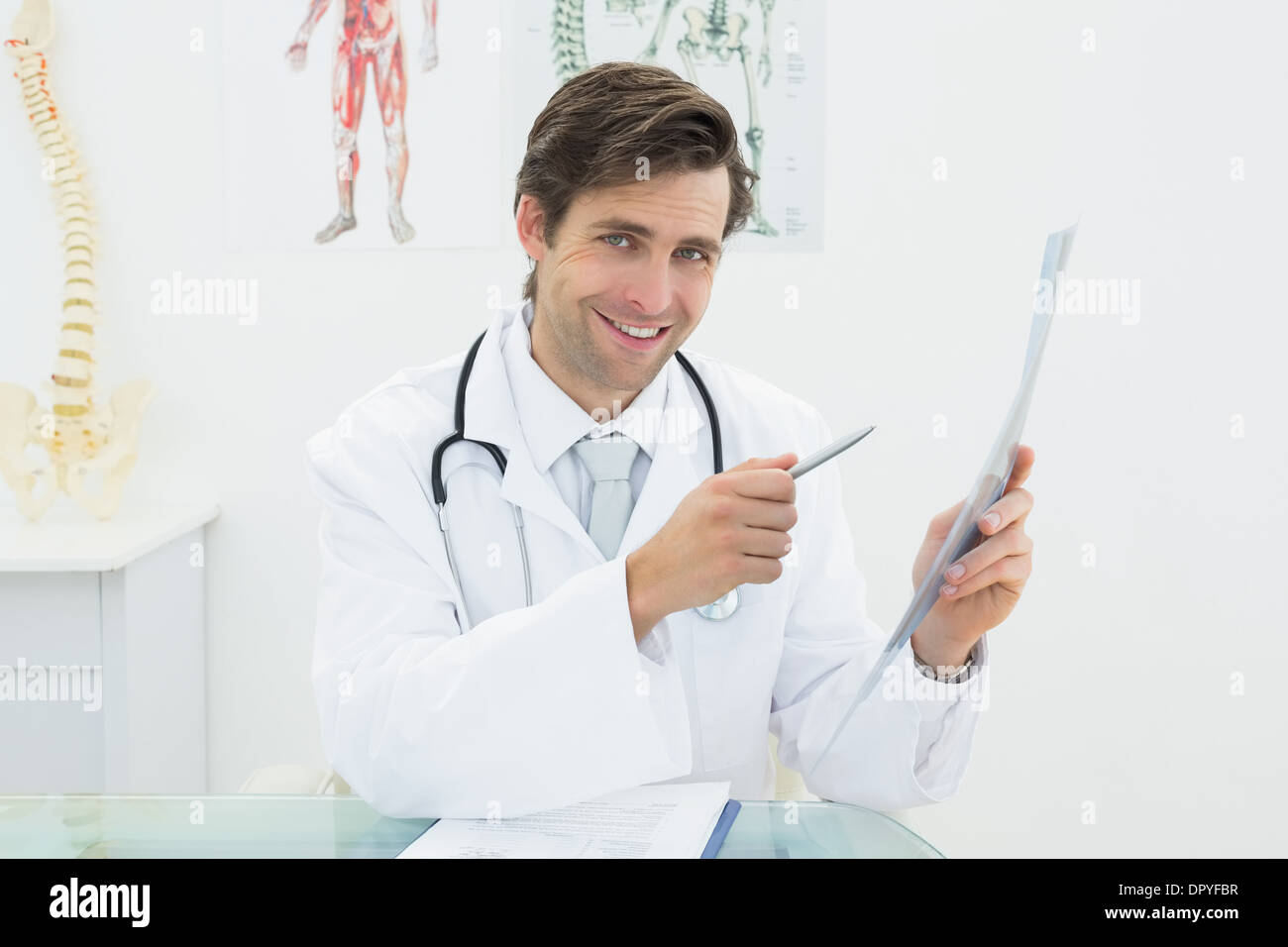 Happy radiologist holding x ray hi-res stock photography and images - Alamy