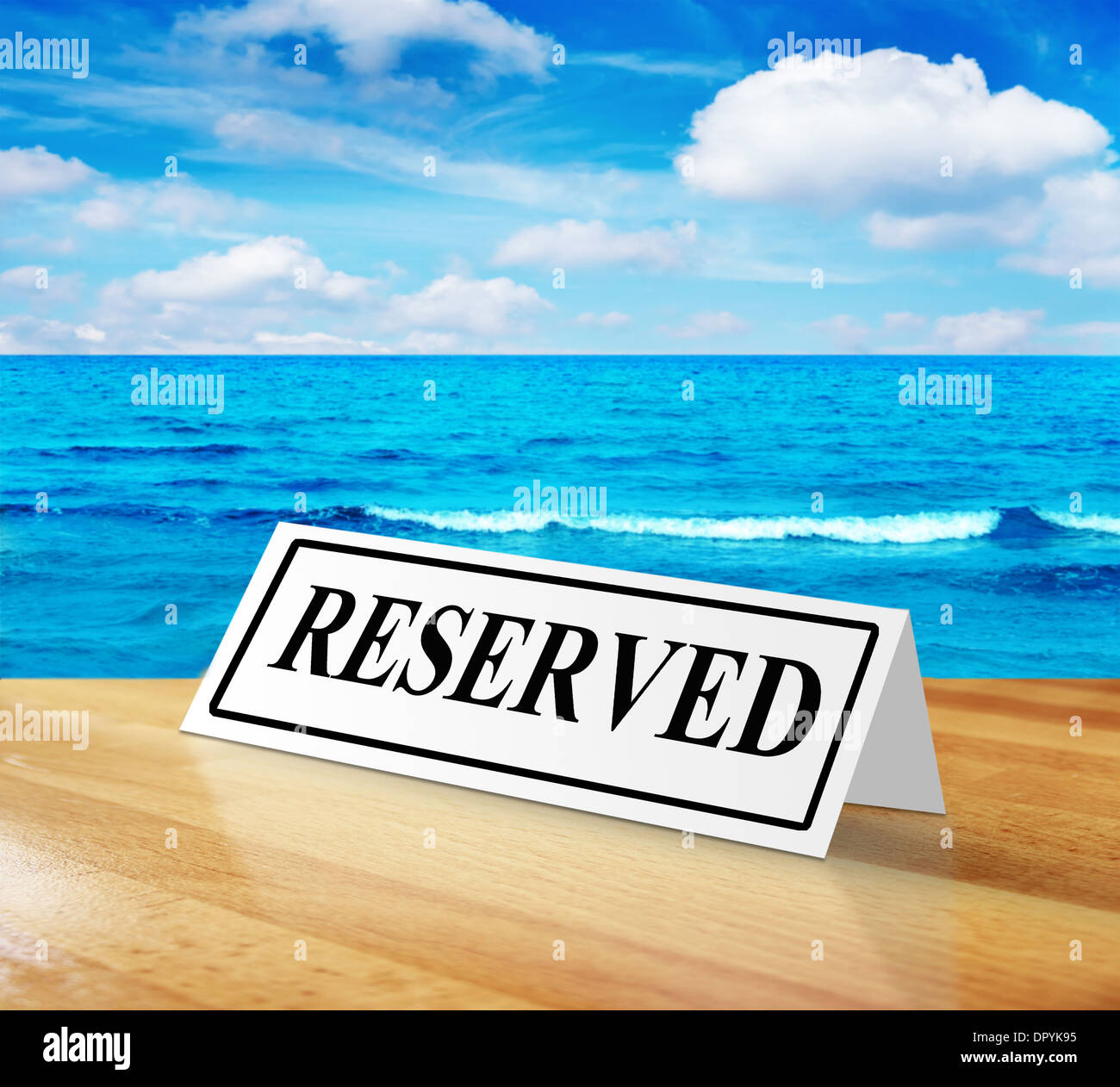 reservation sign with beach Stock Photo - Alamy