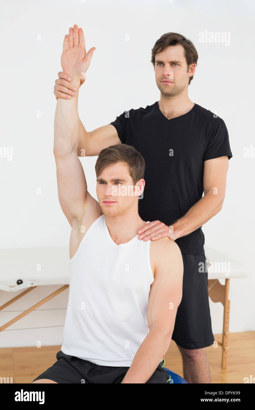 Man helping hand stretching not sport hi-res stock photography and ...