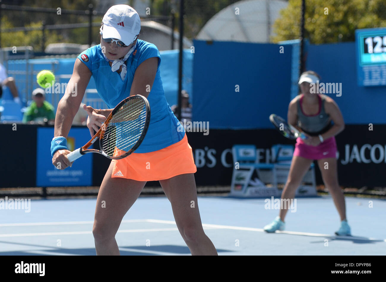 Melbourne. 17th Jan, 2014. Japan's Miki Miyamura (L) and China's Han ...