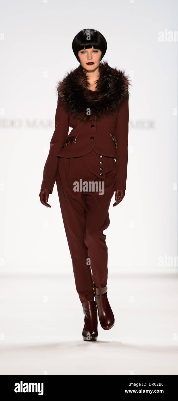 Berlin, Germany. 16th Jan, 2014. A model presents a creation by Guido ...