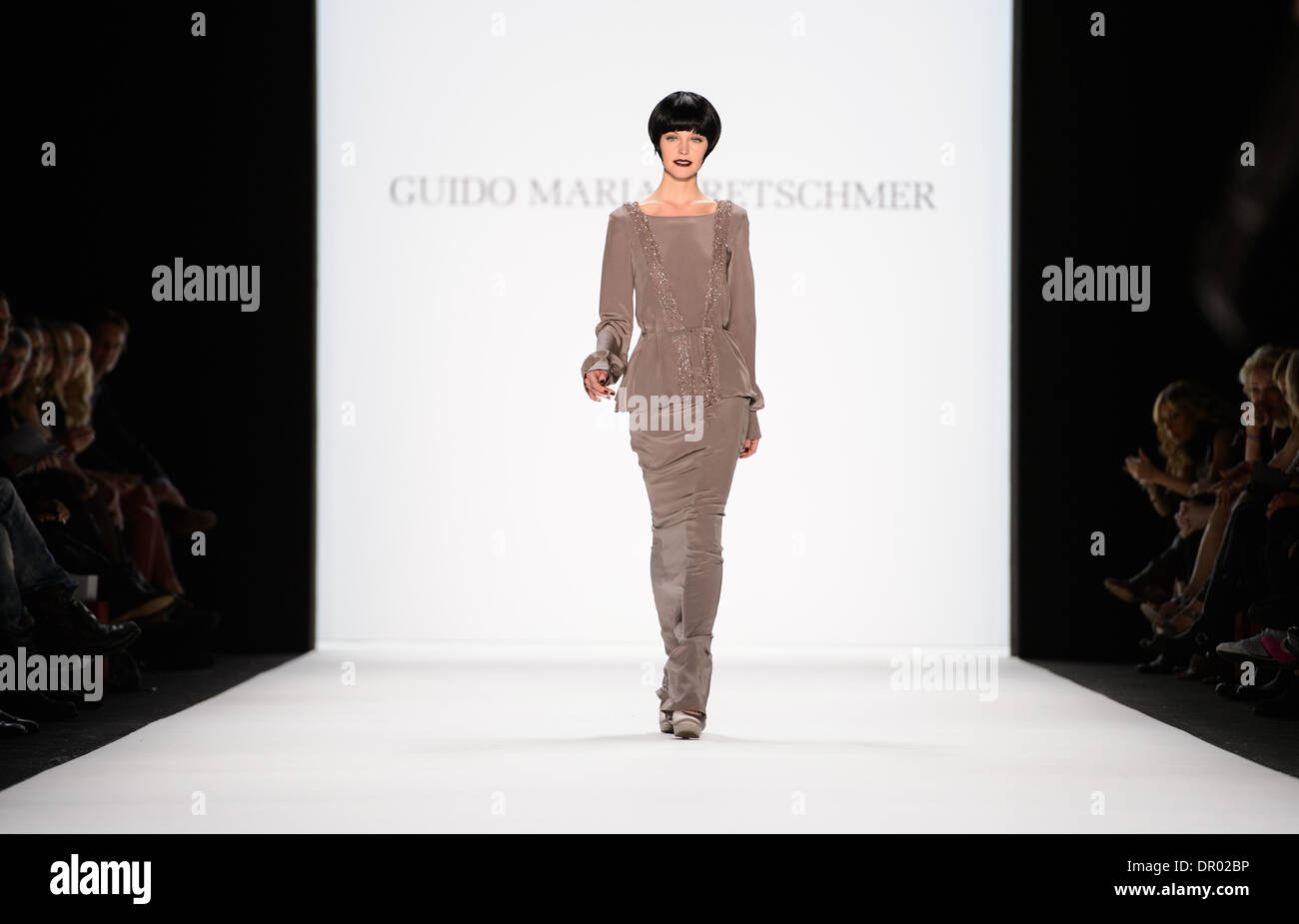 Berlin, Germany. 16th Jan, 2014. A model presents creations by Guido ...