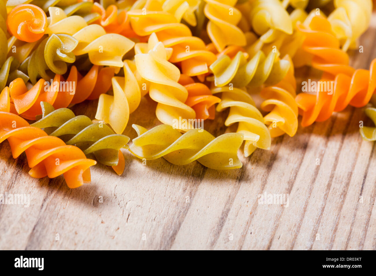 Italian raw pasta - fusilli background closeup Stock Photo - Alamy
