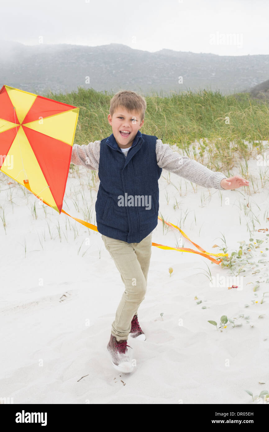 Boy looking at kite hi-res stock photography and images - Alamy