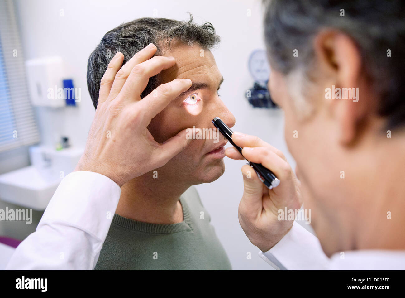 Eye examination man hi-res stock photography and images - Alamy