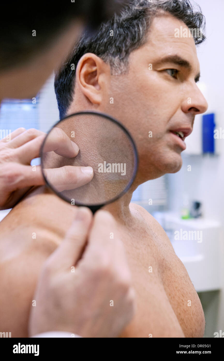 DERMATOLOGY CONSULTATION MAN Stock Photo - Alamy