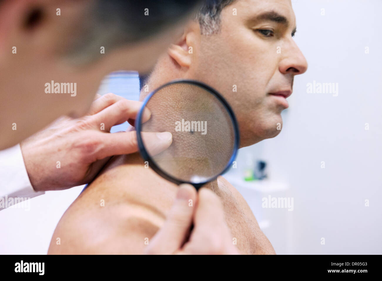 DERMATOLOGY CONSULTATION MAN Stock Photo - Alamy