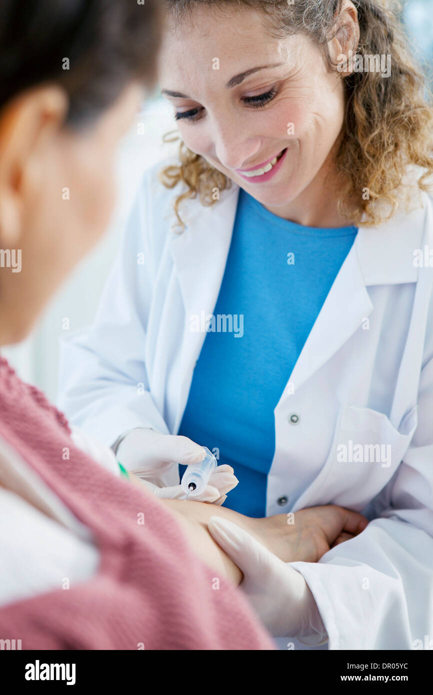 BLOOD SPECIMEN IN A WOMAN Stock Photo - Alamy
