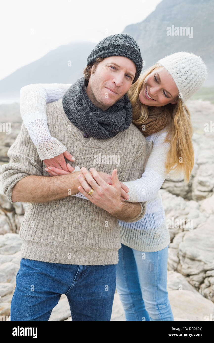 Happy romantic couple together on rocky landscape Stock Photo - Alamy