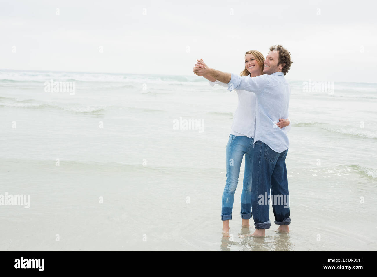 Young couple dancing at beach Stock Photo - Alamy