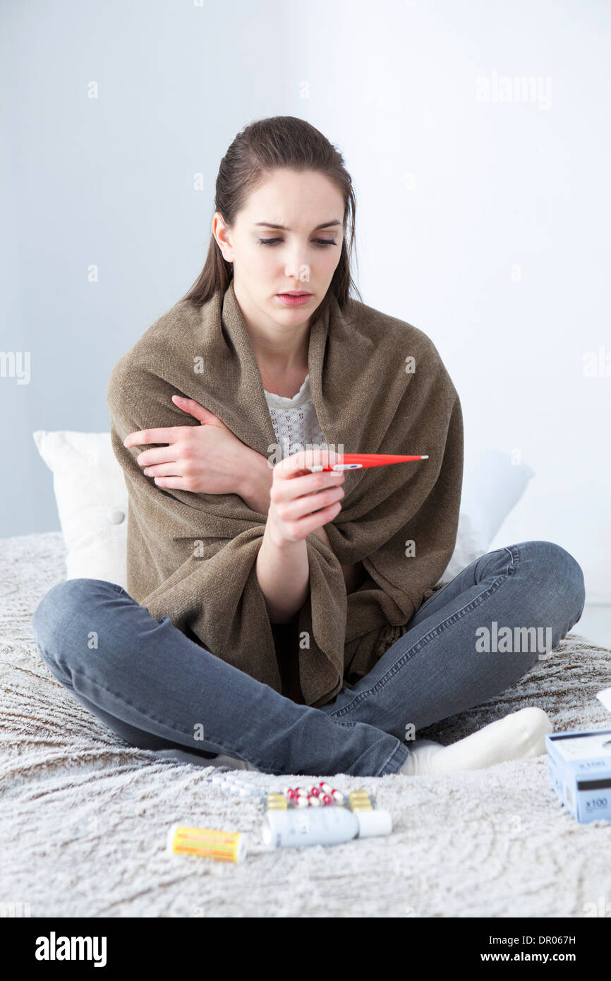 WOMAN WITH FEVER Stock Photo - Alamy
