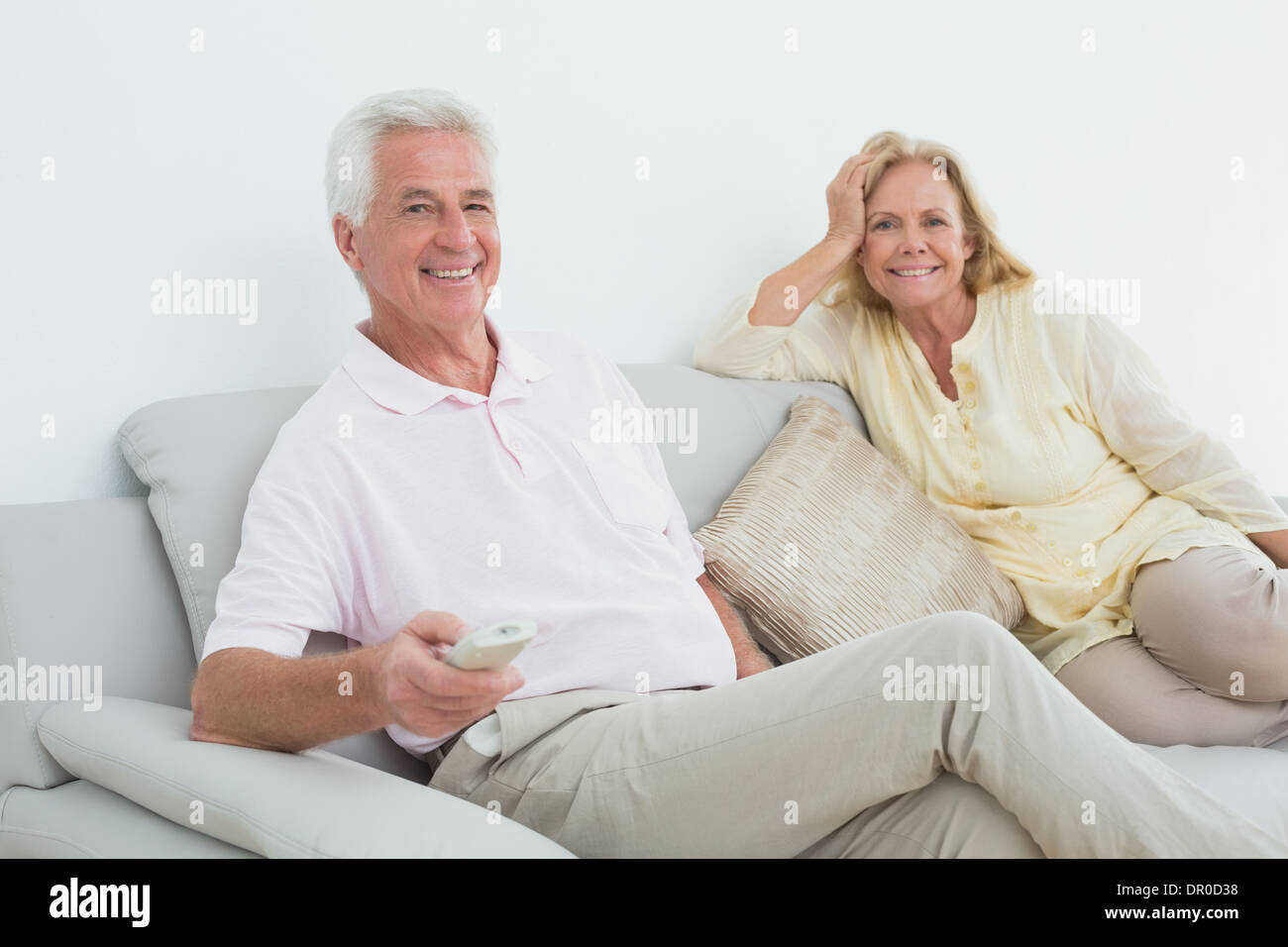 Couple home remote control hi-res stock photography and images - Alamy