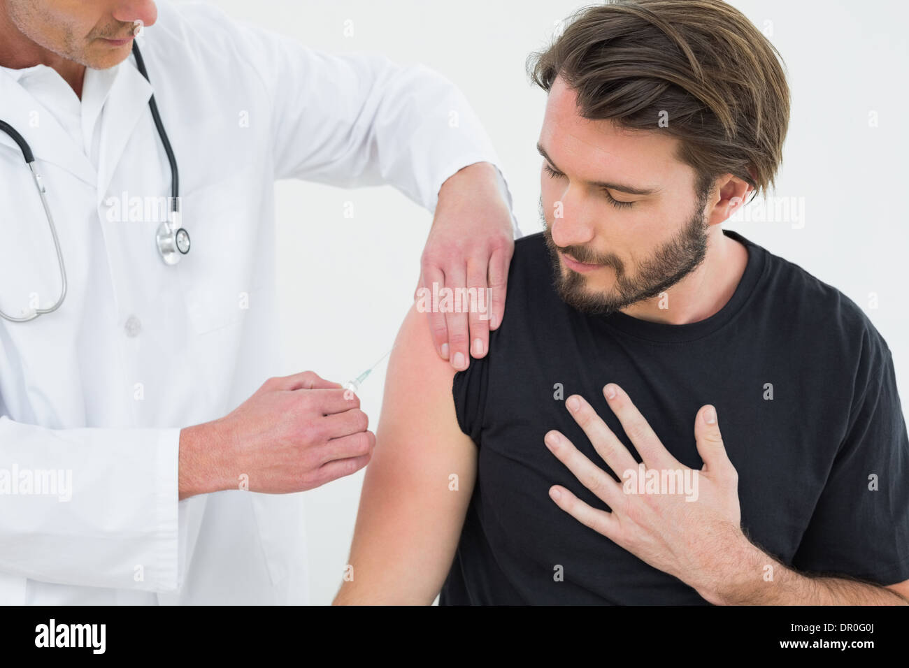 Doctor holding patients hands hi-res stock photography and images - Alamy