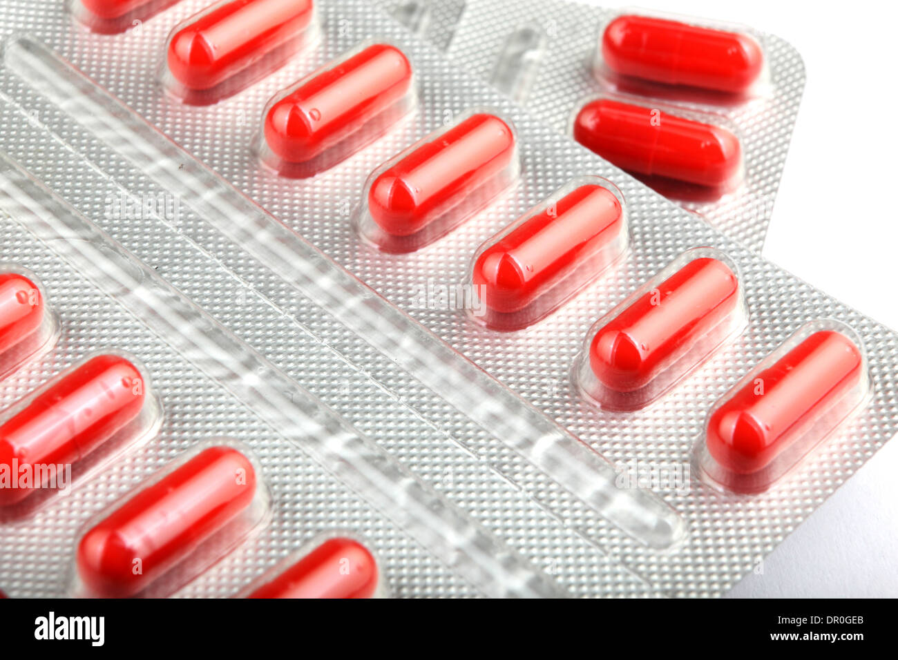 Red Medical Capsules Stock Photo - Alamy