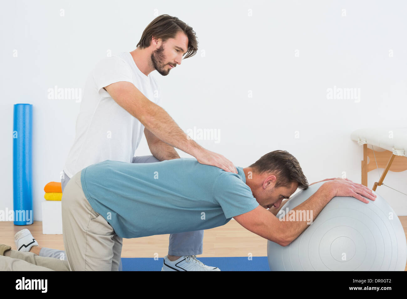 Young man physical therapy hi-res stock photography and images - Alamy