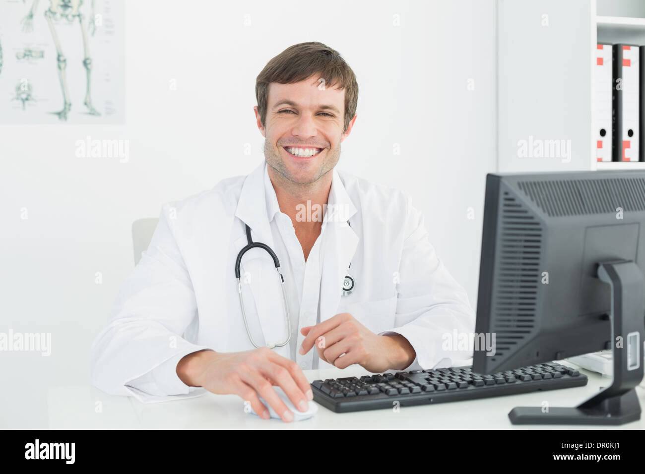 Smiling male medical practitioner hi-res stock photography and images ...
