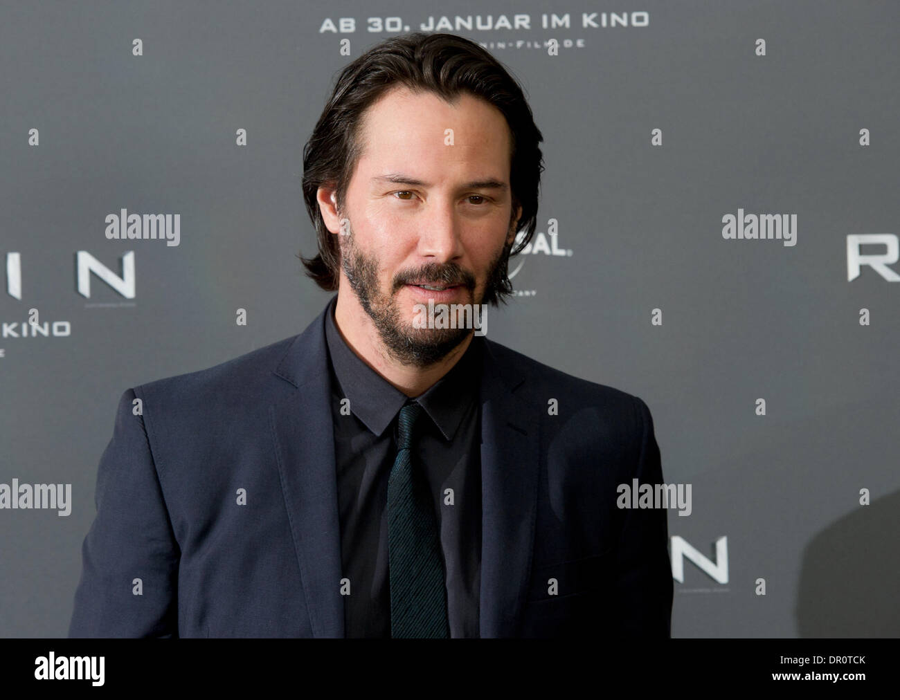 Munich, Germany. 17th Jan, 2014. Canadian actor Keanu Reeves stands ...