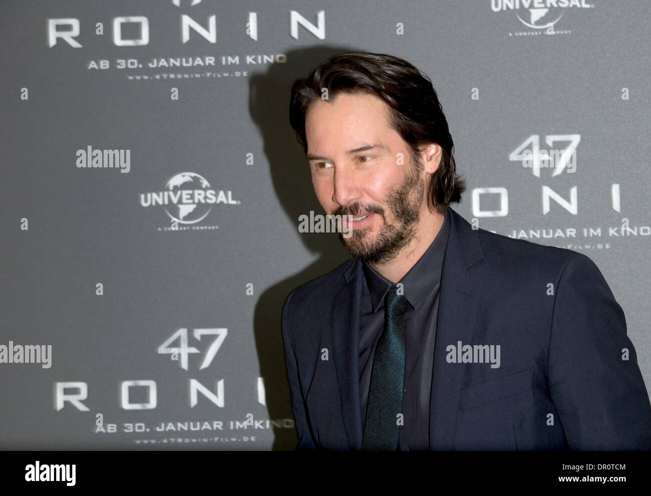 Munich, Germany. 17th Jan, 2014. Canadian actor Keanu Reeves stands ...