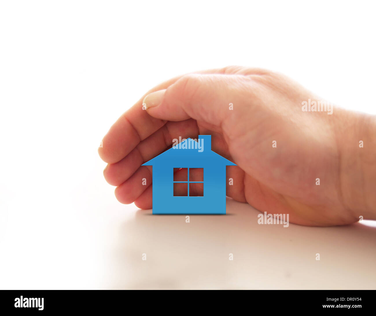 Little House under hand Stock Photo - Alamy