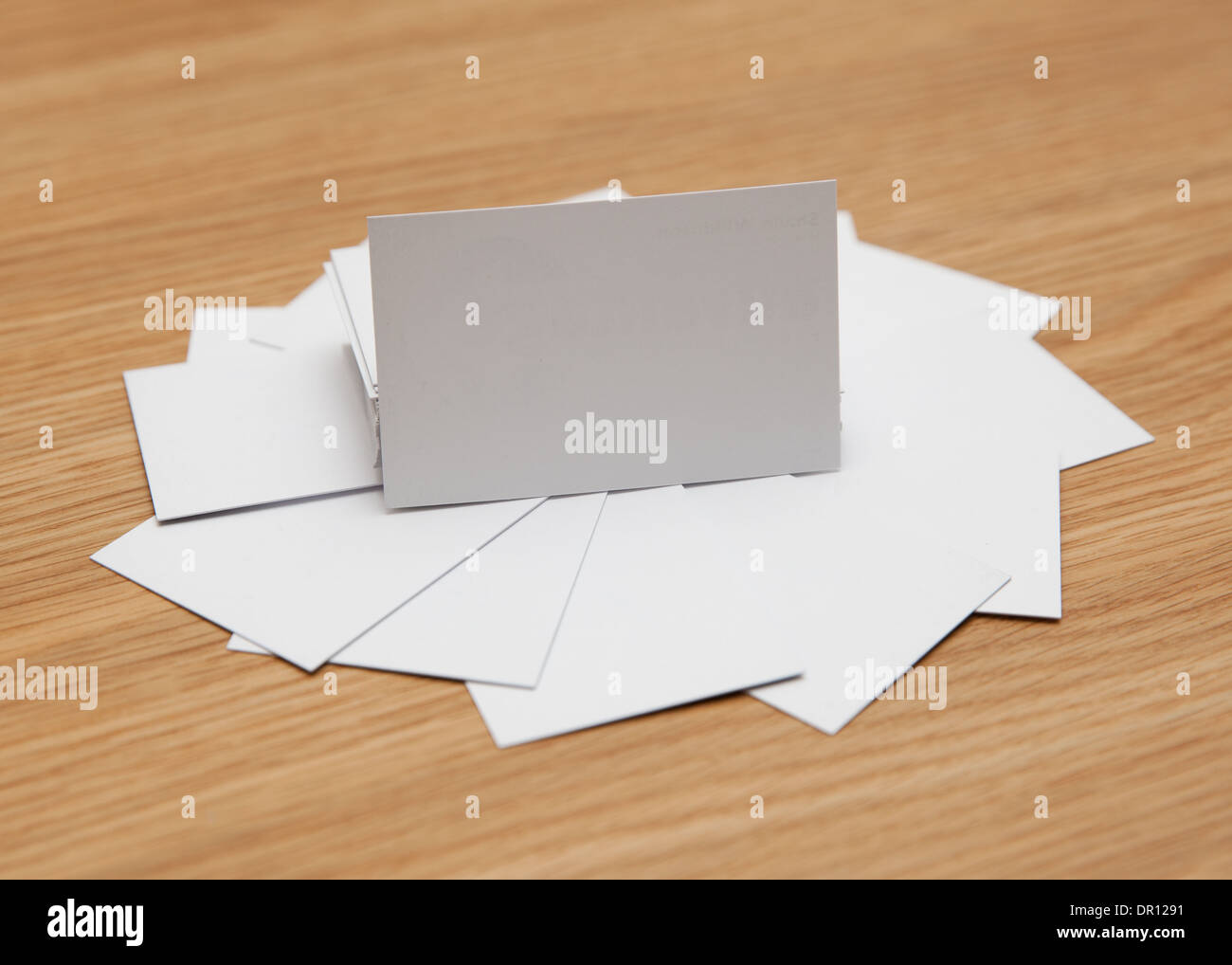 Business card pile on desk Stock Photo - Alamy