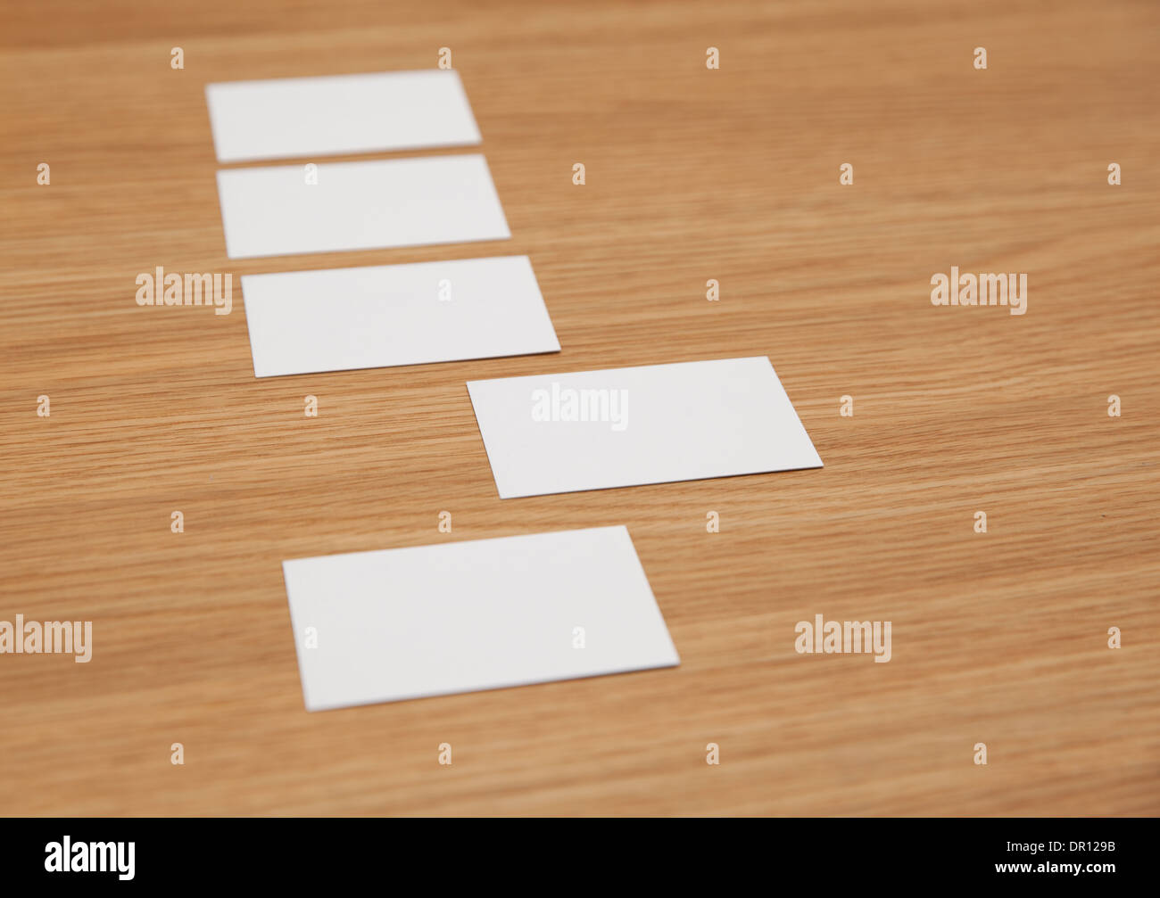 Business card pile on desk Stock Photo - Alamy