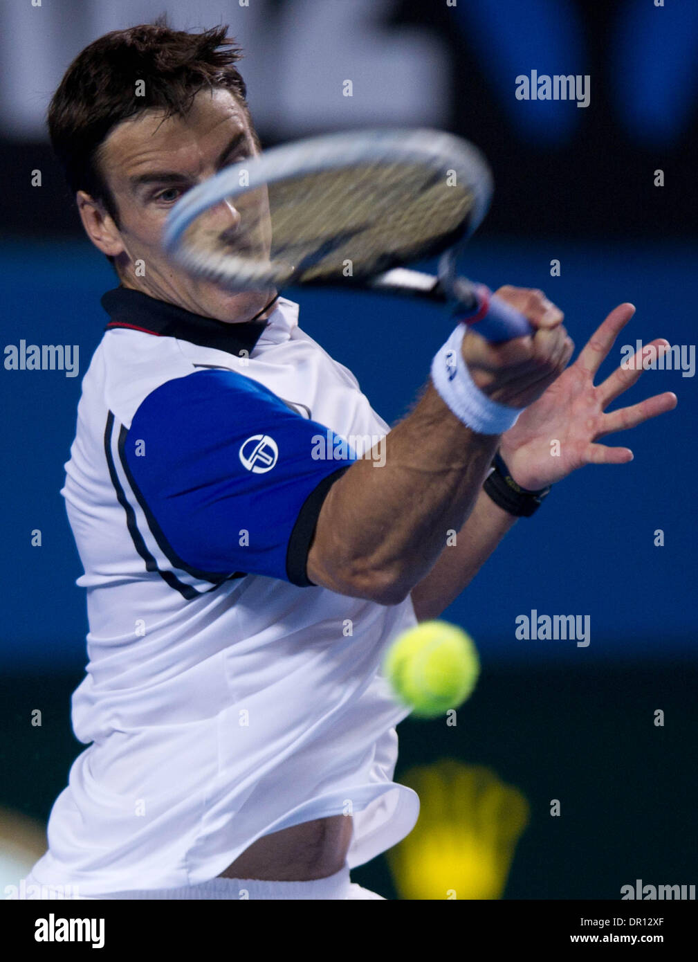 Melbourne, Australia. 17th Jan, 2014. Tommy Robredo of Spain hits a ...