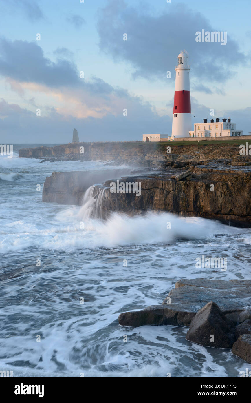Rough seas crash over rocks near Portland Bill Lighthouse, Dorset Stock ...