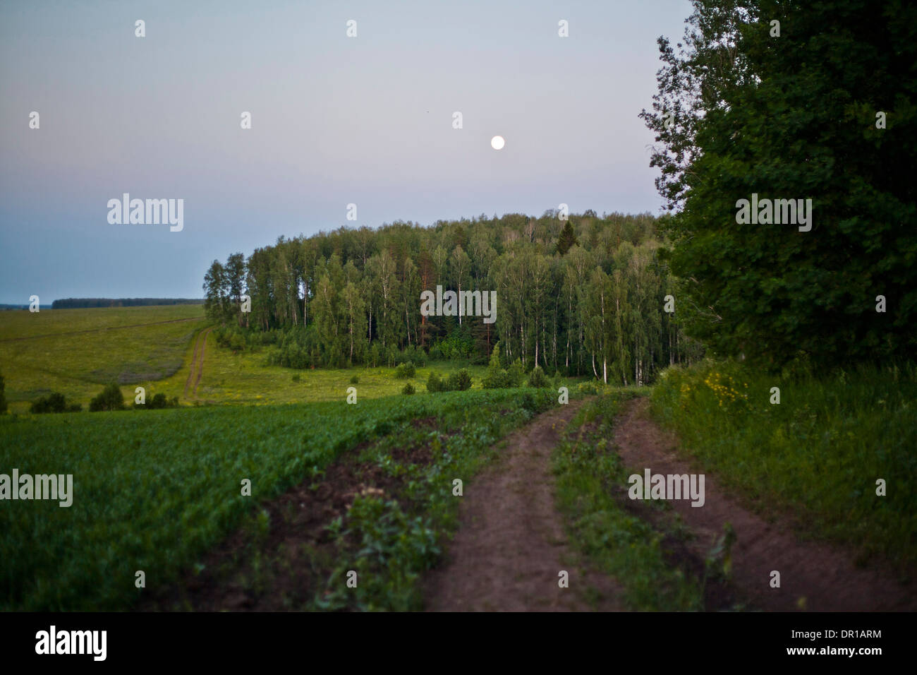 Moon over village hi-res stock photography and images - Alamy