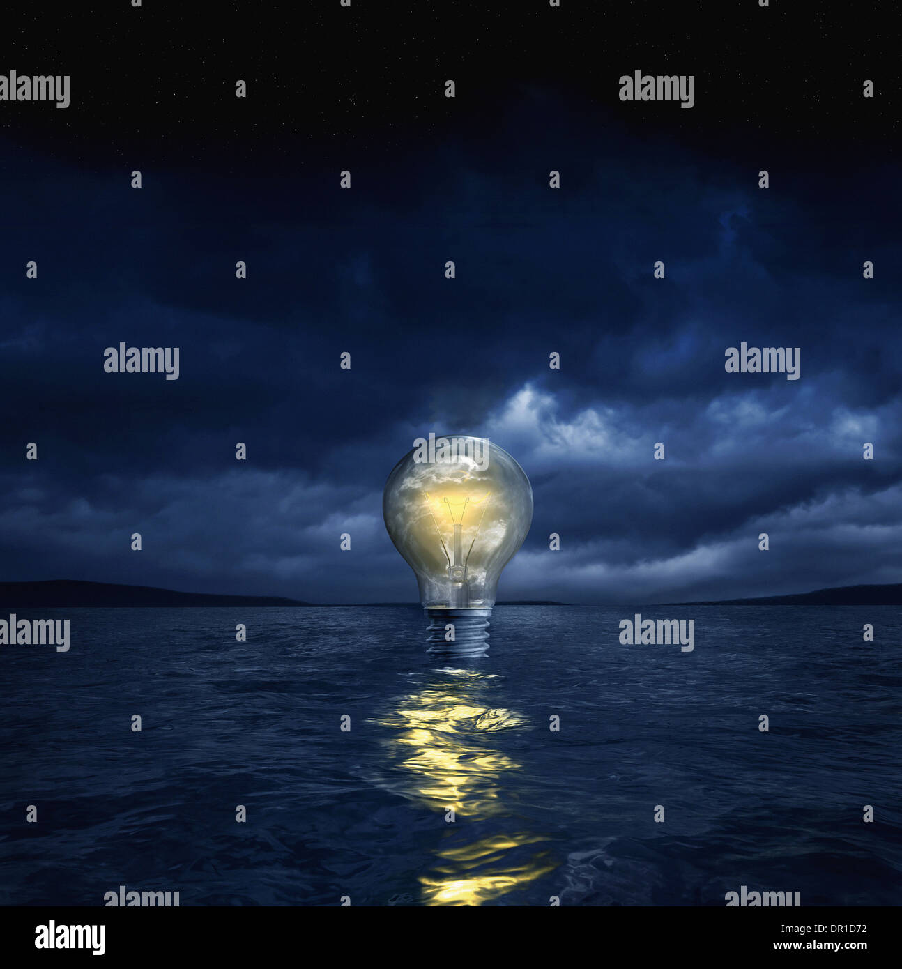 Illuminated light bulb floating in sea Stock Photo - Alamy