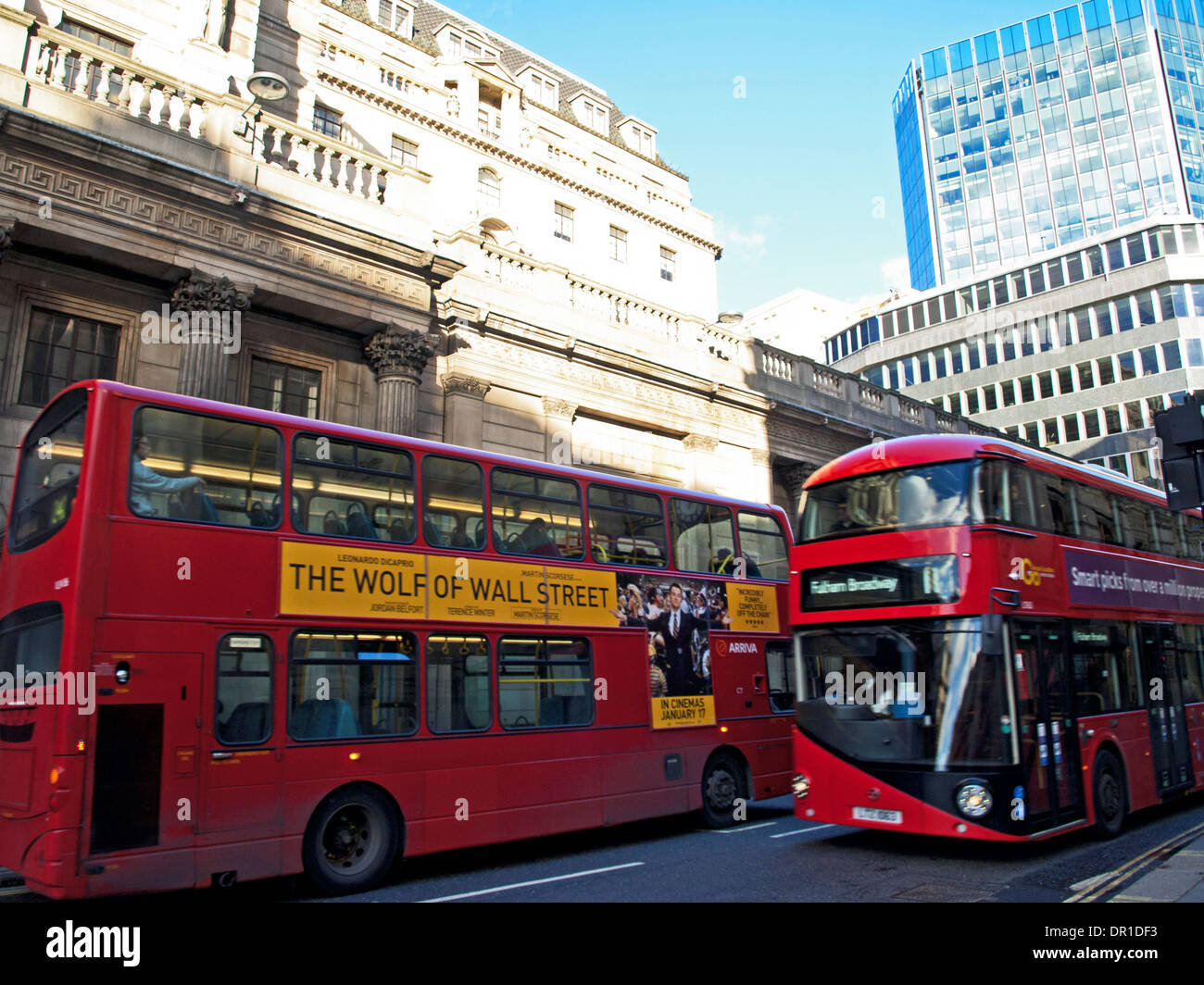 Double-decker buses on Threadneedle Street showing the Bank of England ...