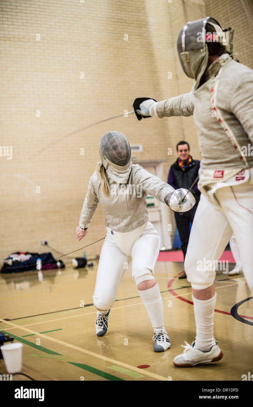 Two women Aberystwyth university students fencers competing at fencing ...
