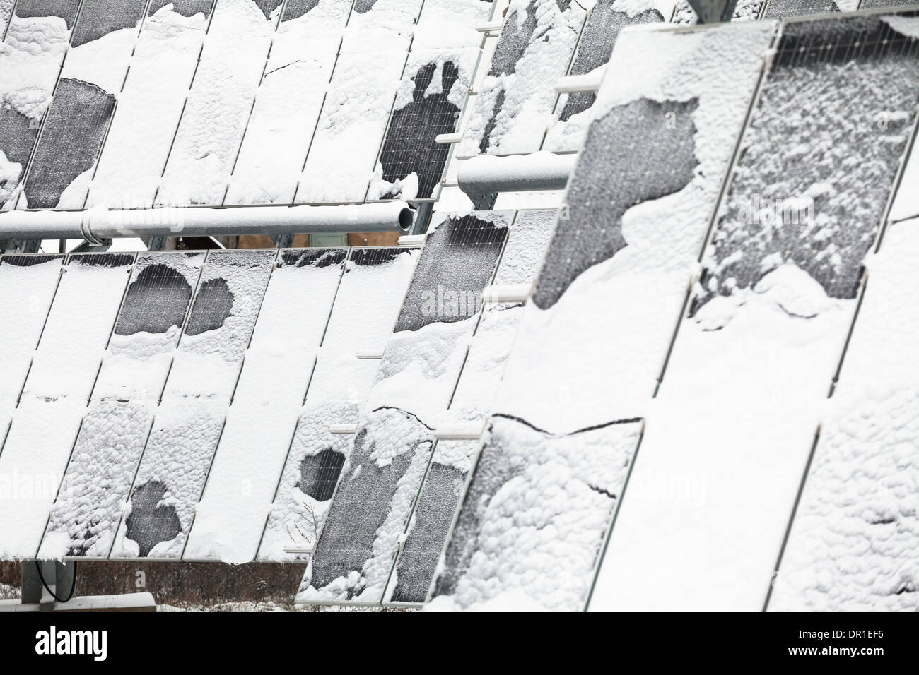 Solar panels covered with snow hi-res stock photography and images - Alamy
