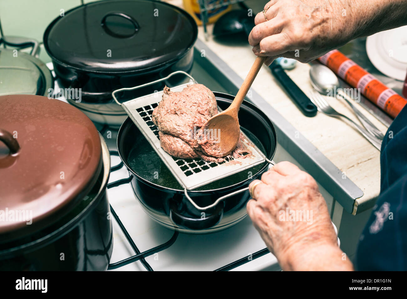 Preparation of homemade liver spaetzle soup, Czech Republic Stock Photo ...