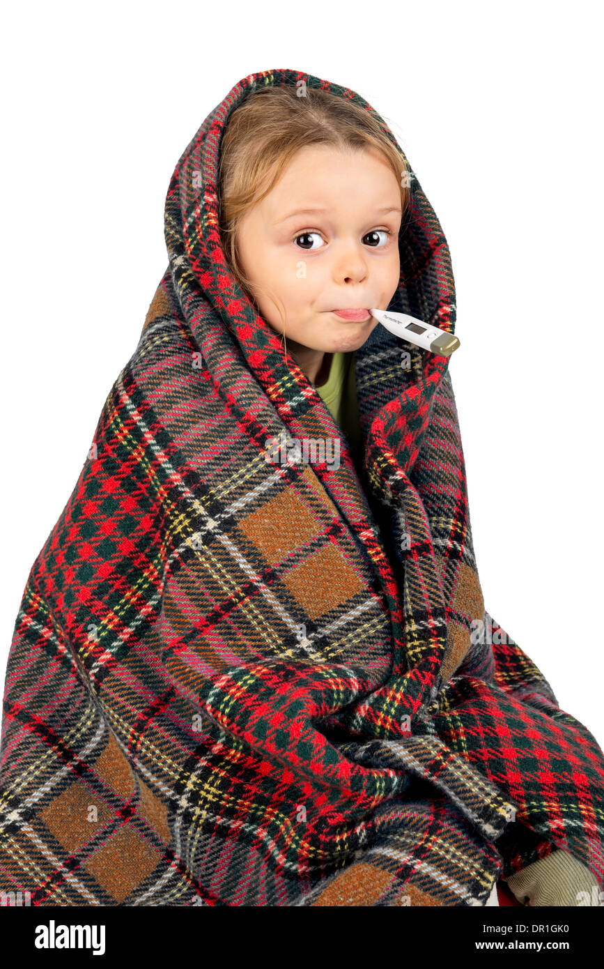 Young girl with a cold wrapped in a blanket with a thermometer Stock ...