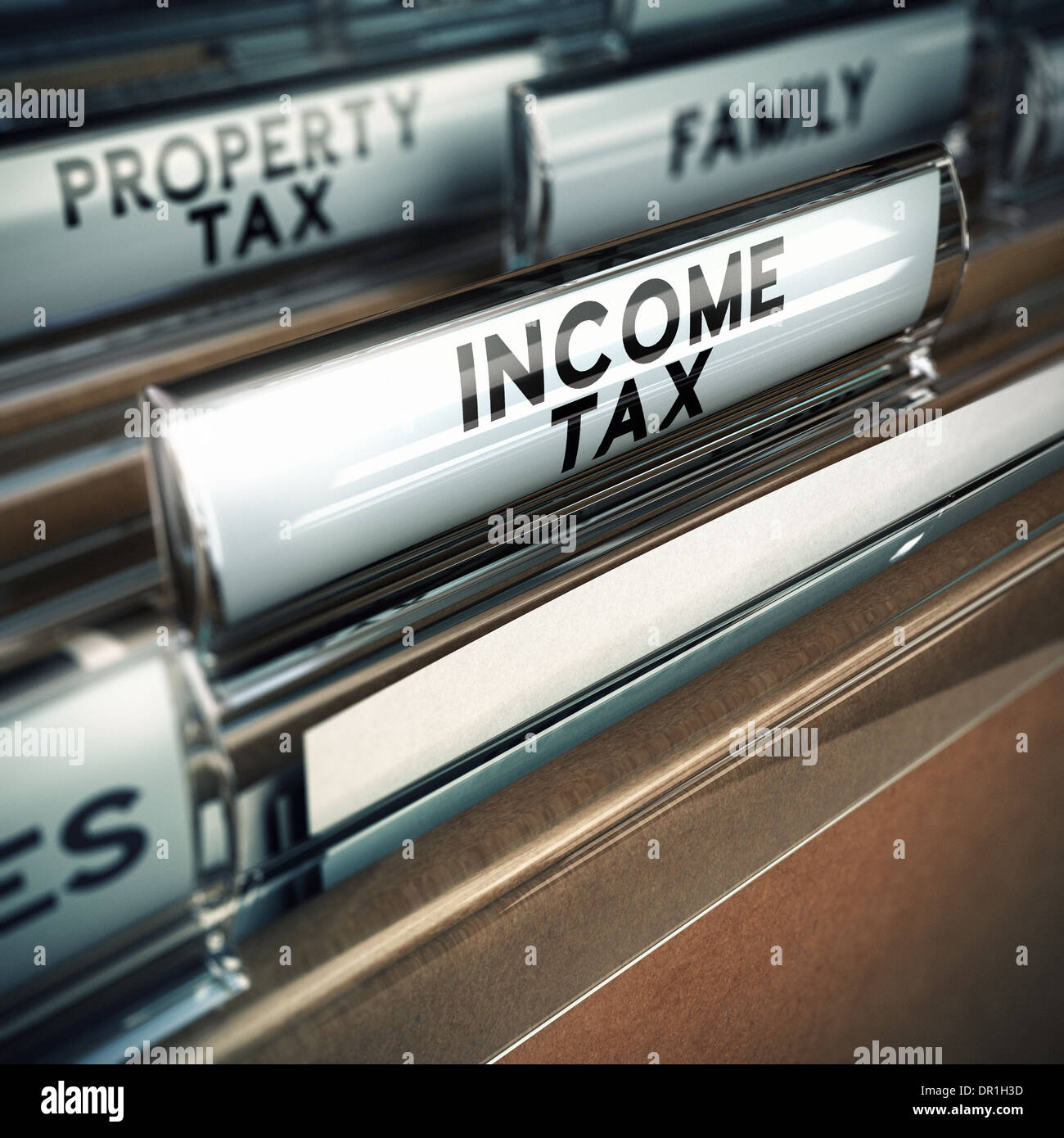 files with close up and focus on the income tax tab, blur effect ...