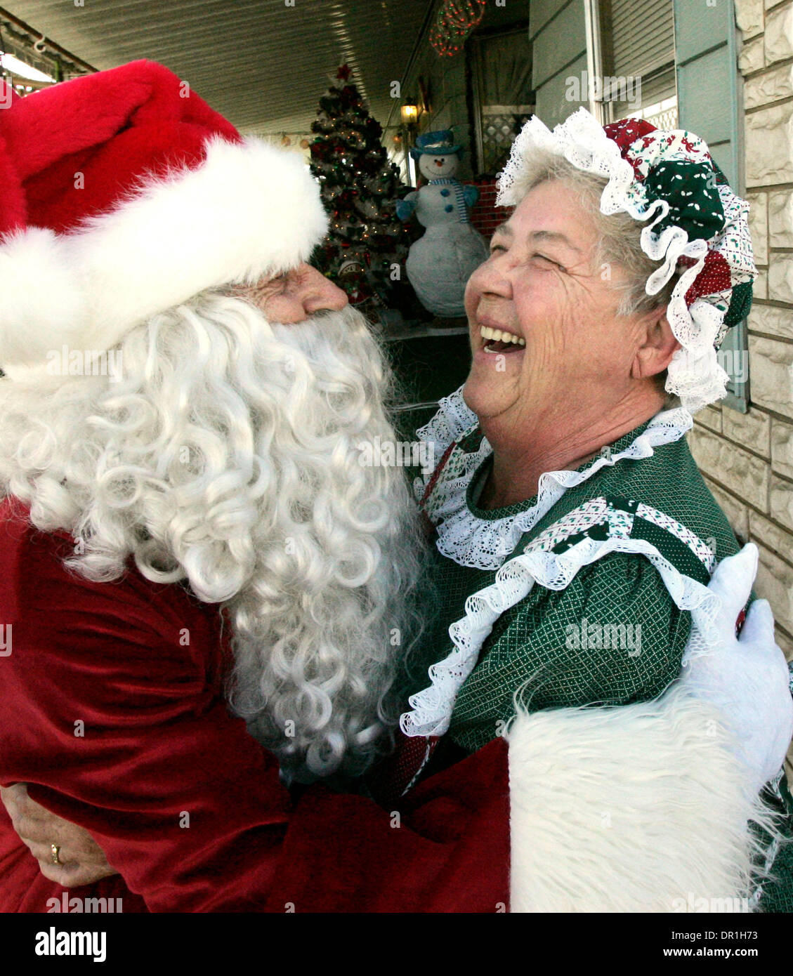 Actor ARNOLD SCHWARZENEGGER wearing a Santa Claus suit as the star of ...