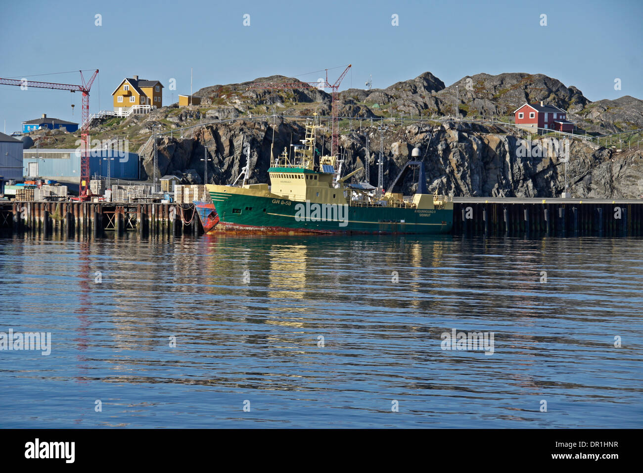 Fishing boats, harbor, and colorful houses of Sisimiut (Holsteinsborg ...