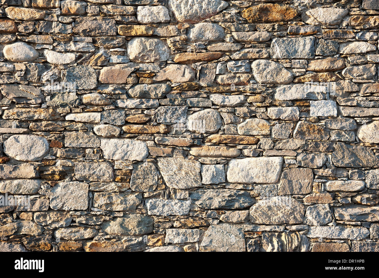 Stacked stone wall background horizontal Stock Photo - Alamy