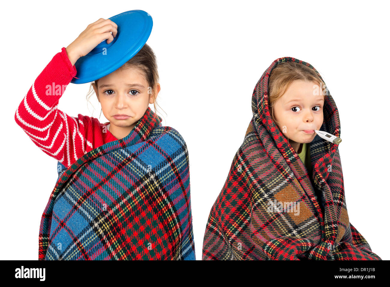 Young girls with a cold wrapped in a blanket with a thermometer Stock ...