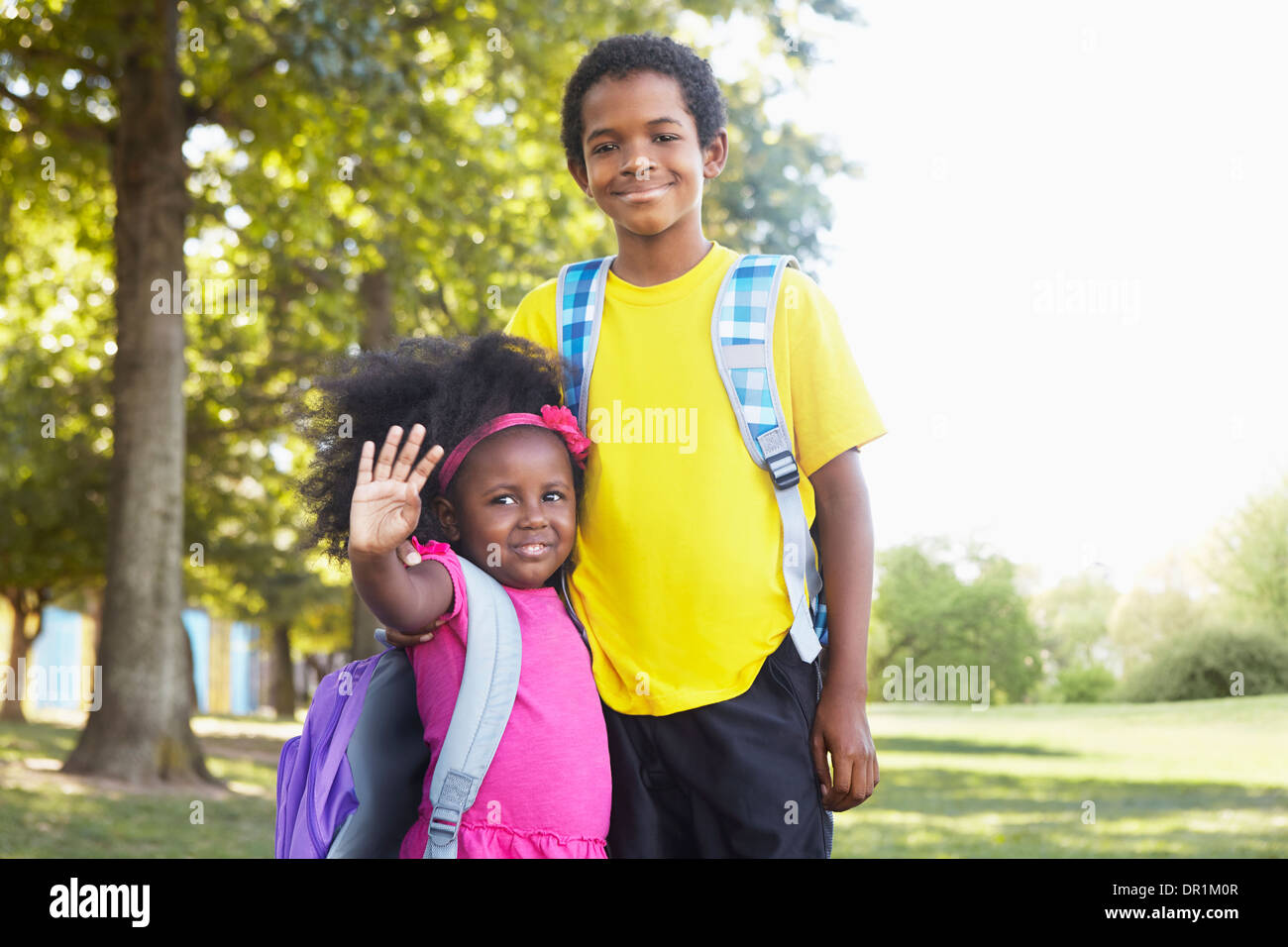 Mixed race children smiling together Stock Photo - Alamy