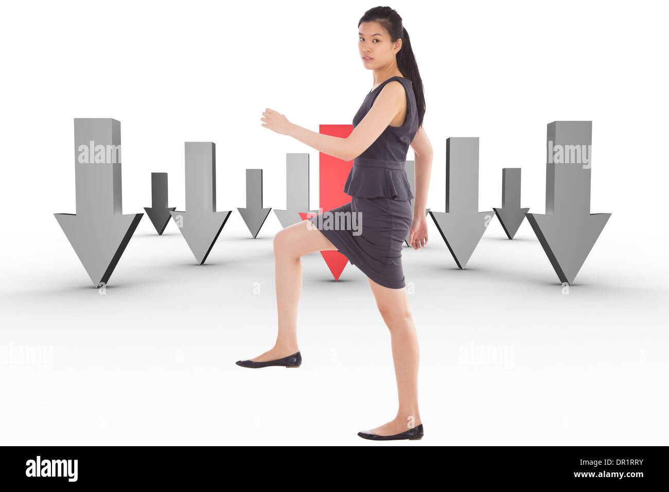 Composite image of businesswoman stepping up Stock Photo - Alamy