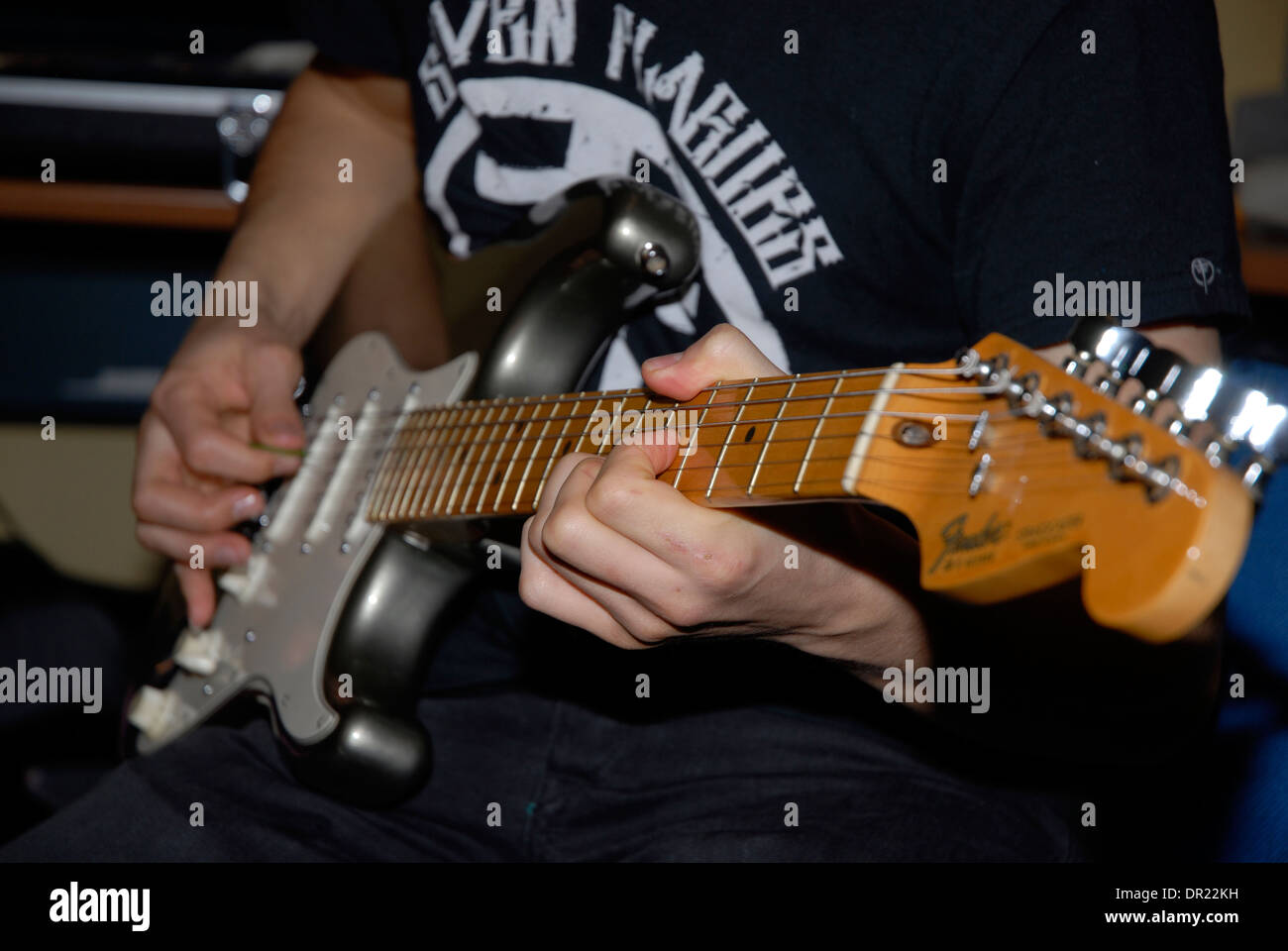 man touch guitar Stock Photo - Alamy