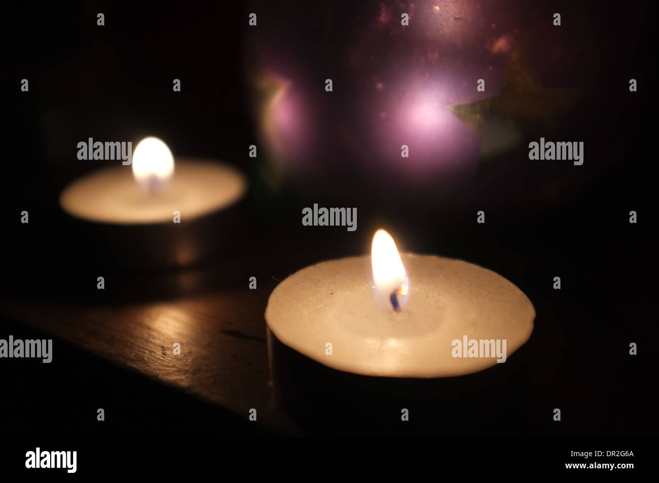 A set of candles lit Stock Photo - Alamy